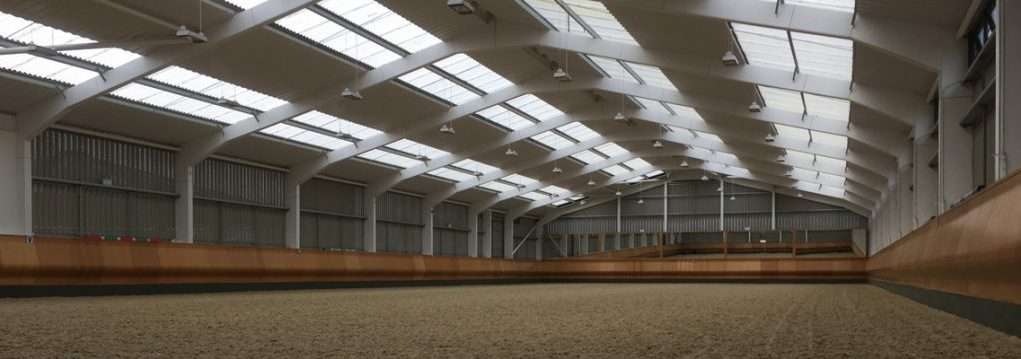 Welcome Sportrack Synthetic Surfaces Equestrian Arena's and surfaces